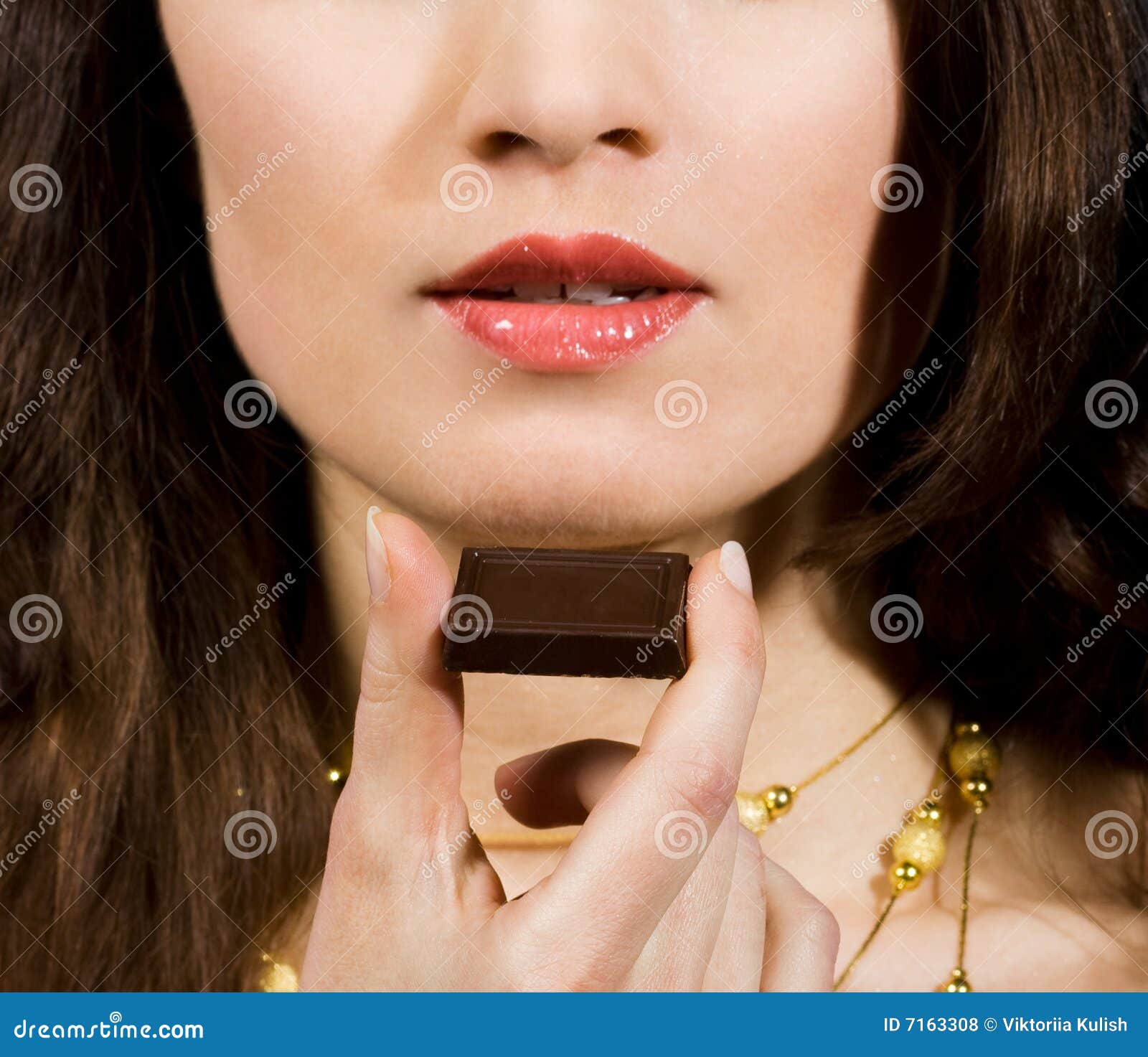 Woman eating chocolate stock photo. Image of joyful, chocolate - 7163308
