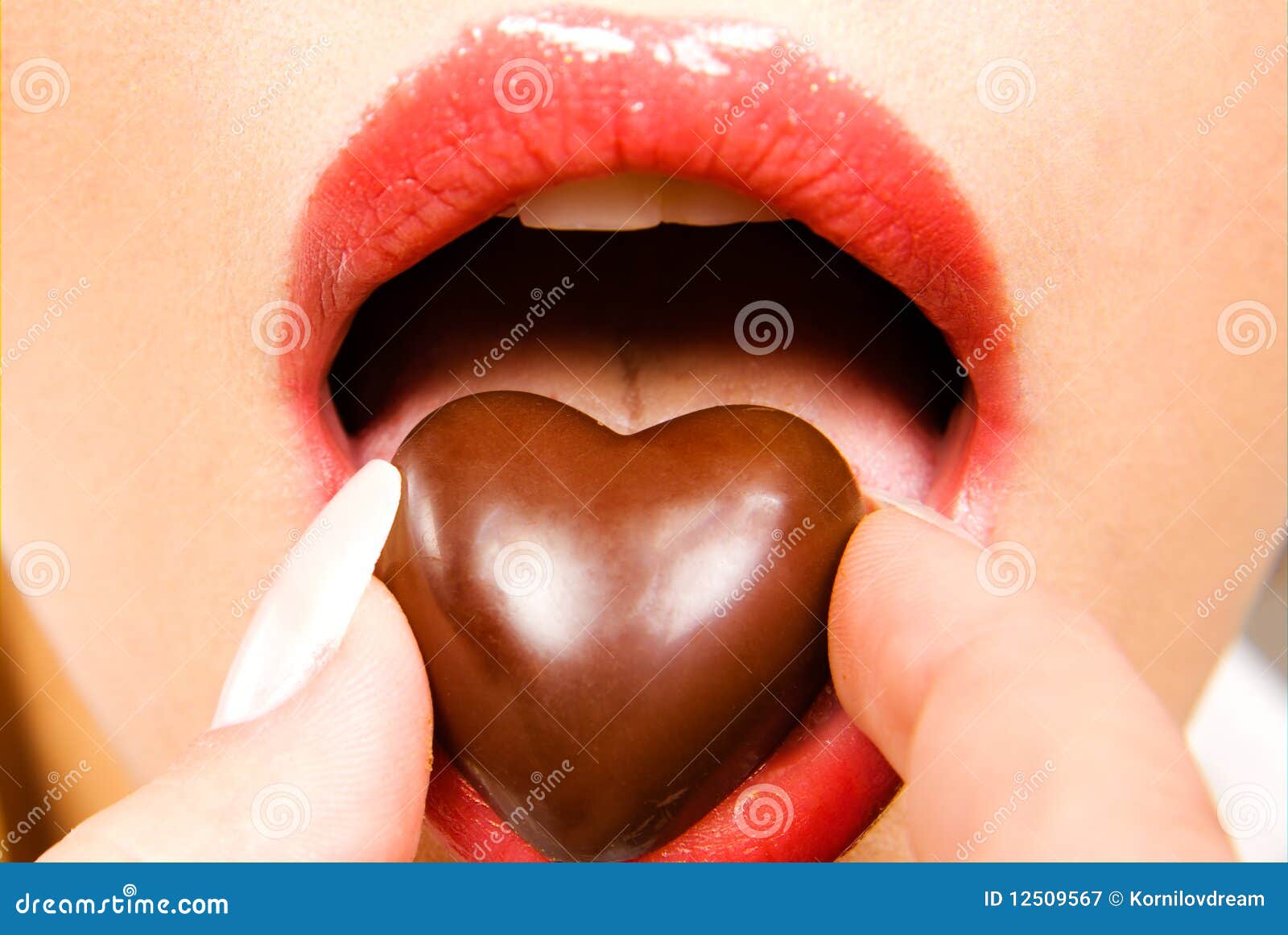 Woman Eating Chocolate Candy Stock Image - Image of food, open: 12509567