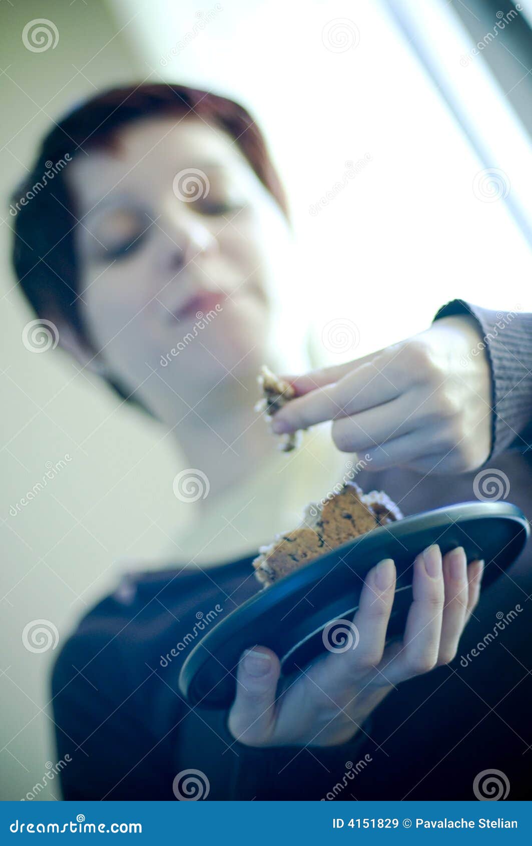 Woman eating cookies stock image. Image of life, girl - 4151829