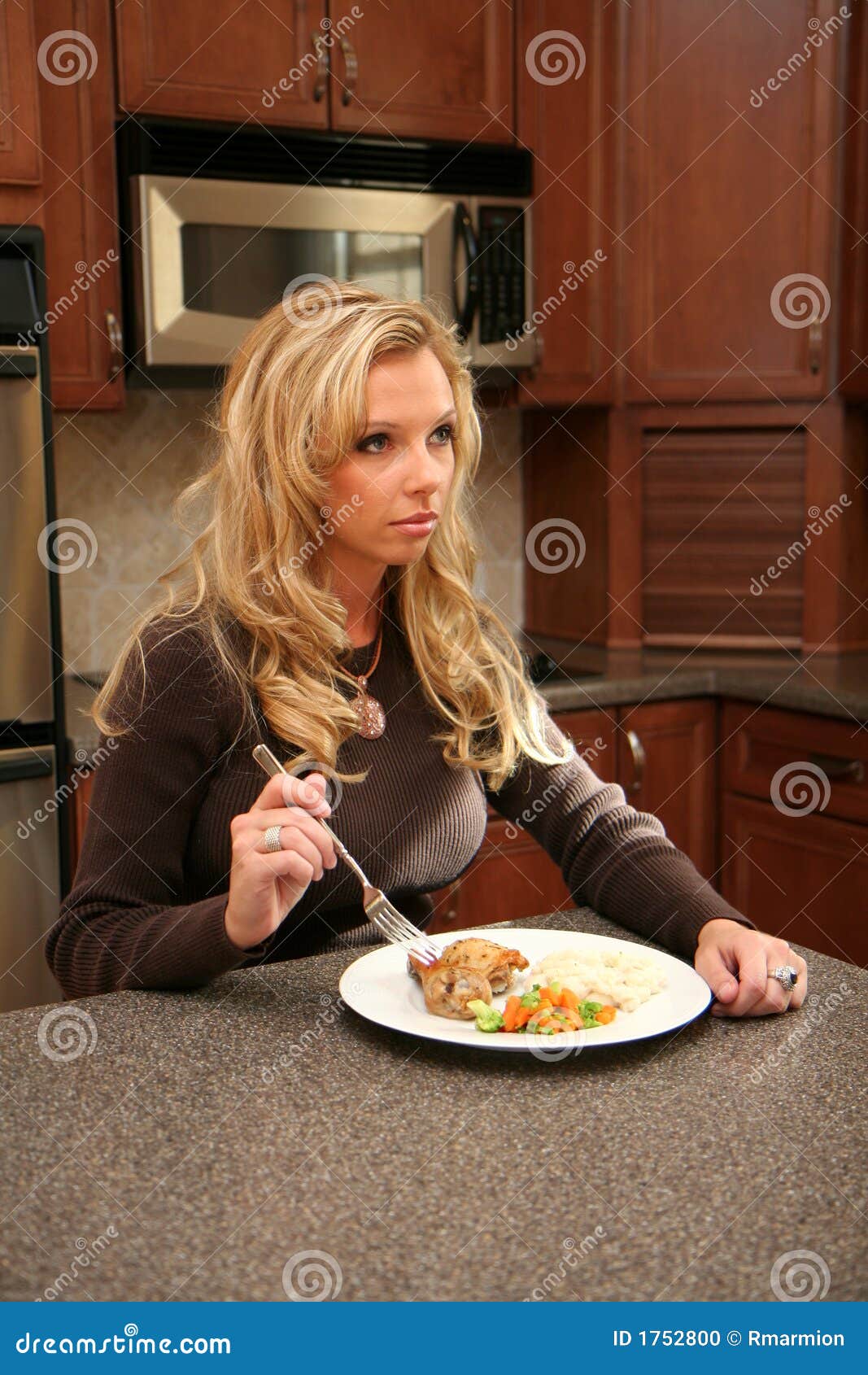 Woman Eating Dinner stock photo. Image of pretty, eating - 1752800