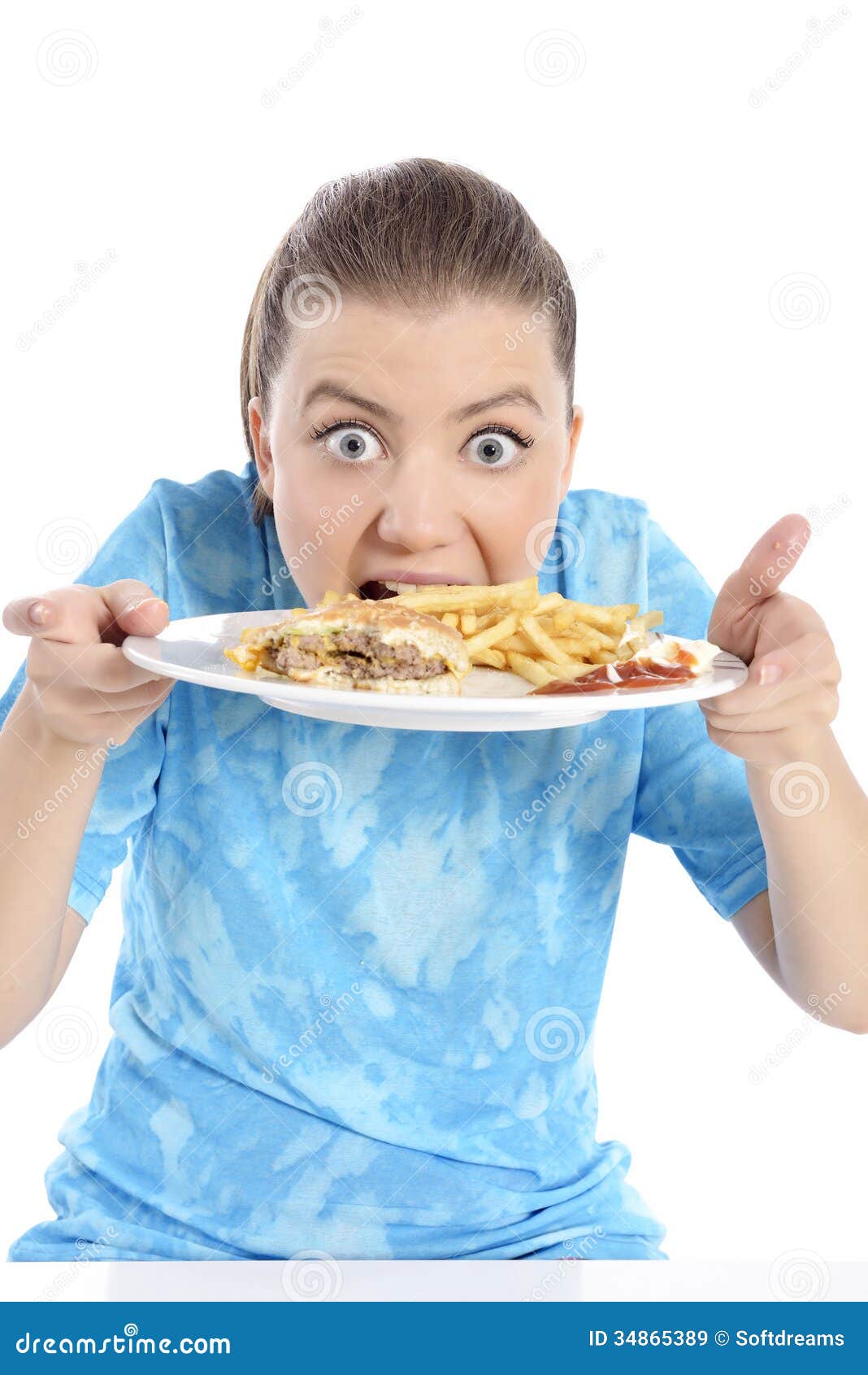 Woman eating fast food stock image. Image of calorie - 34865389