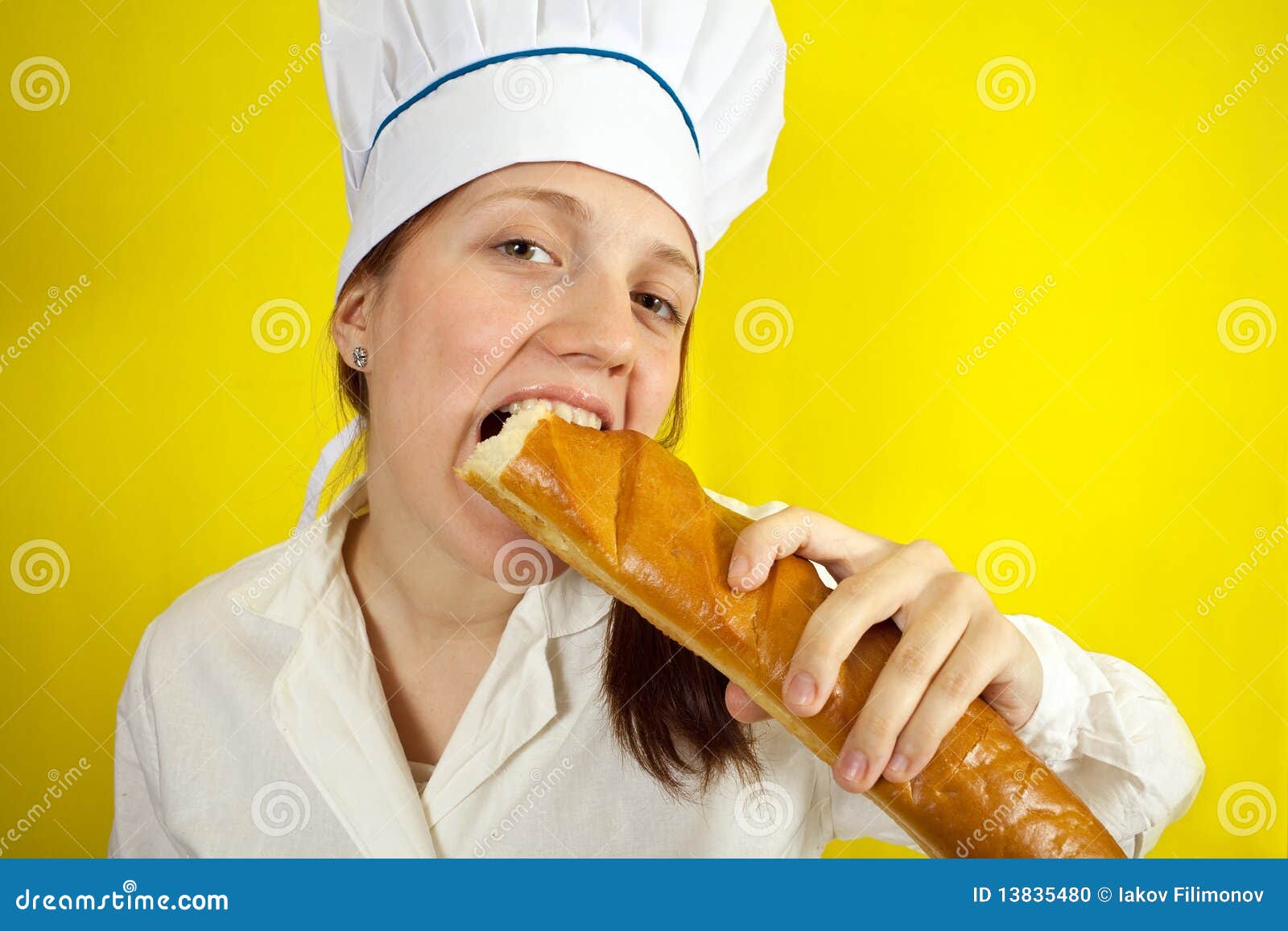 Woman is Eating French Bread Stock Photo - Image of french, happy: 13835480