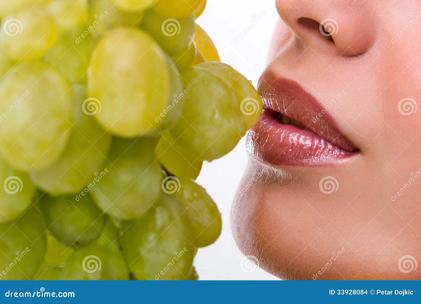 Woman eating grapes stock photo. Image of diet, grape - 33928084