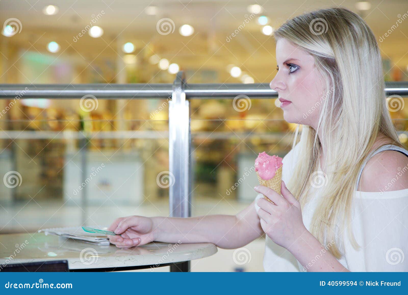 Woman eating the ice stock photo. Image of blond, lady - 40599594