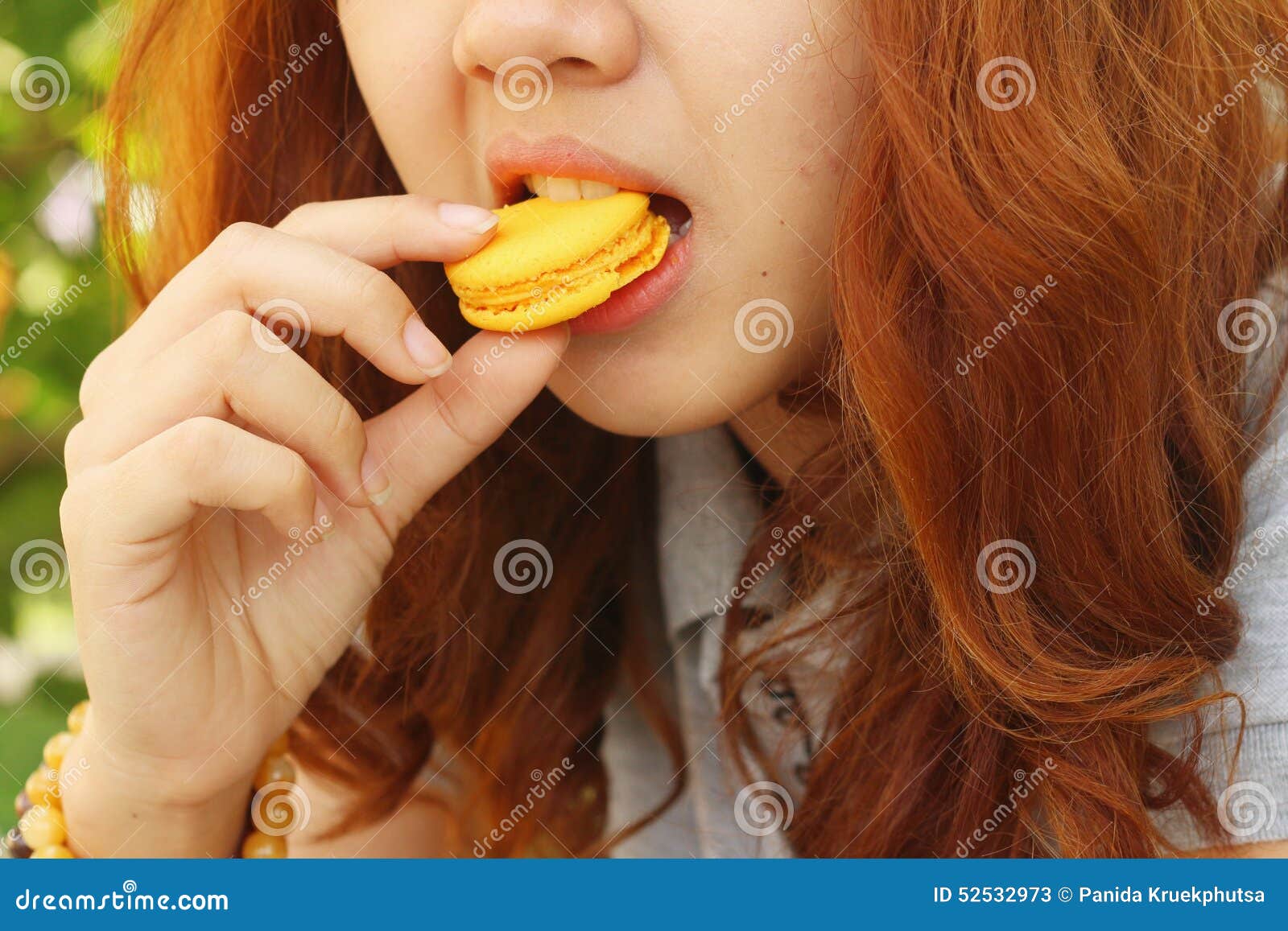 Woman Eating a Macaron at the Park. Stock Image - Image of macaroon ...