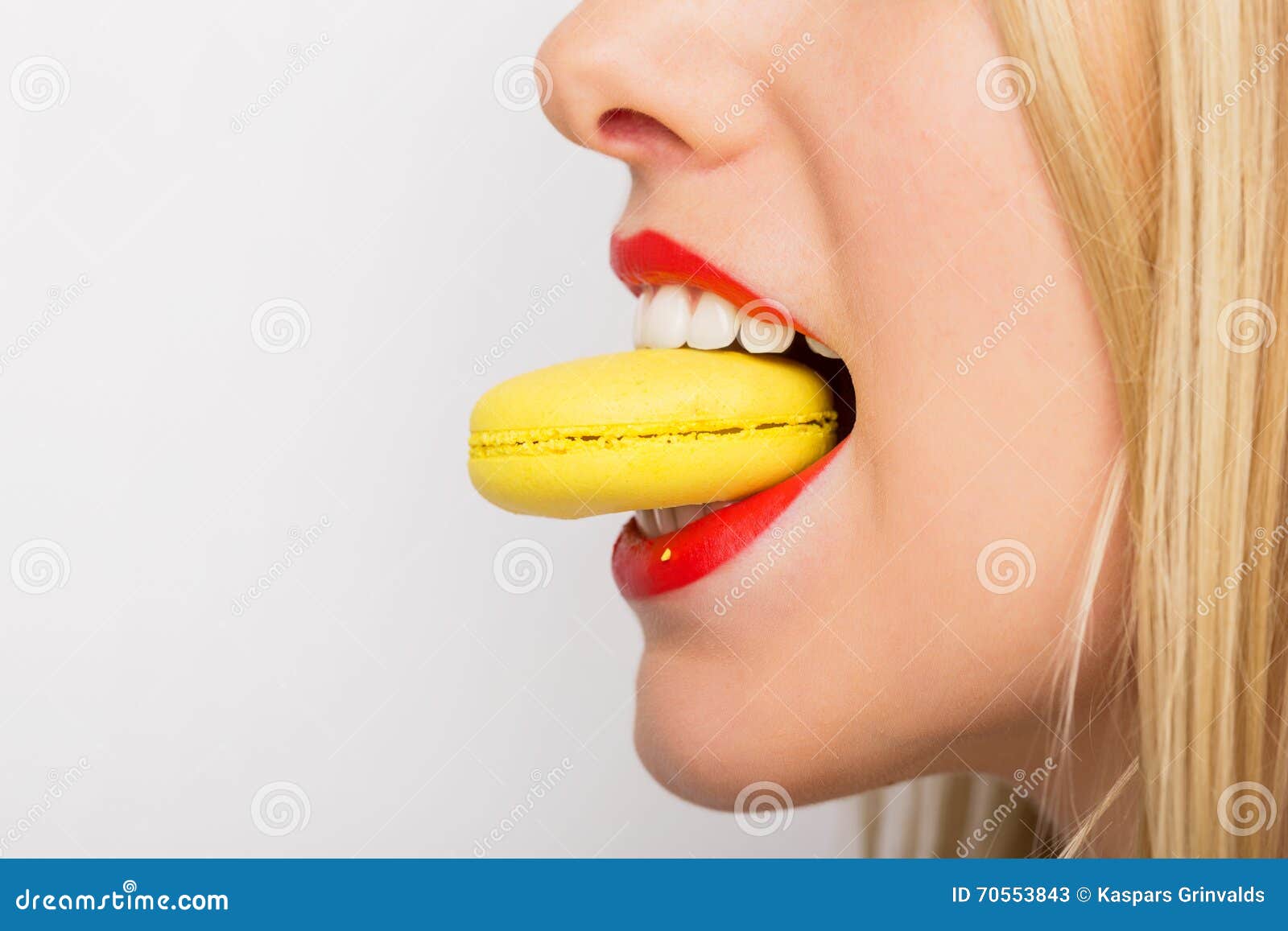 Woman eating macaroon stock image. Image of maccaron - 70553843