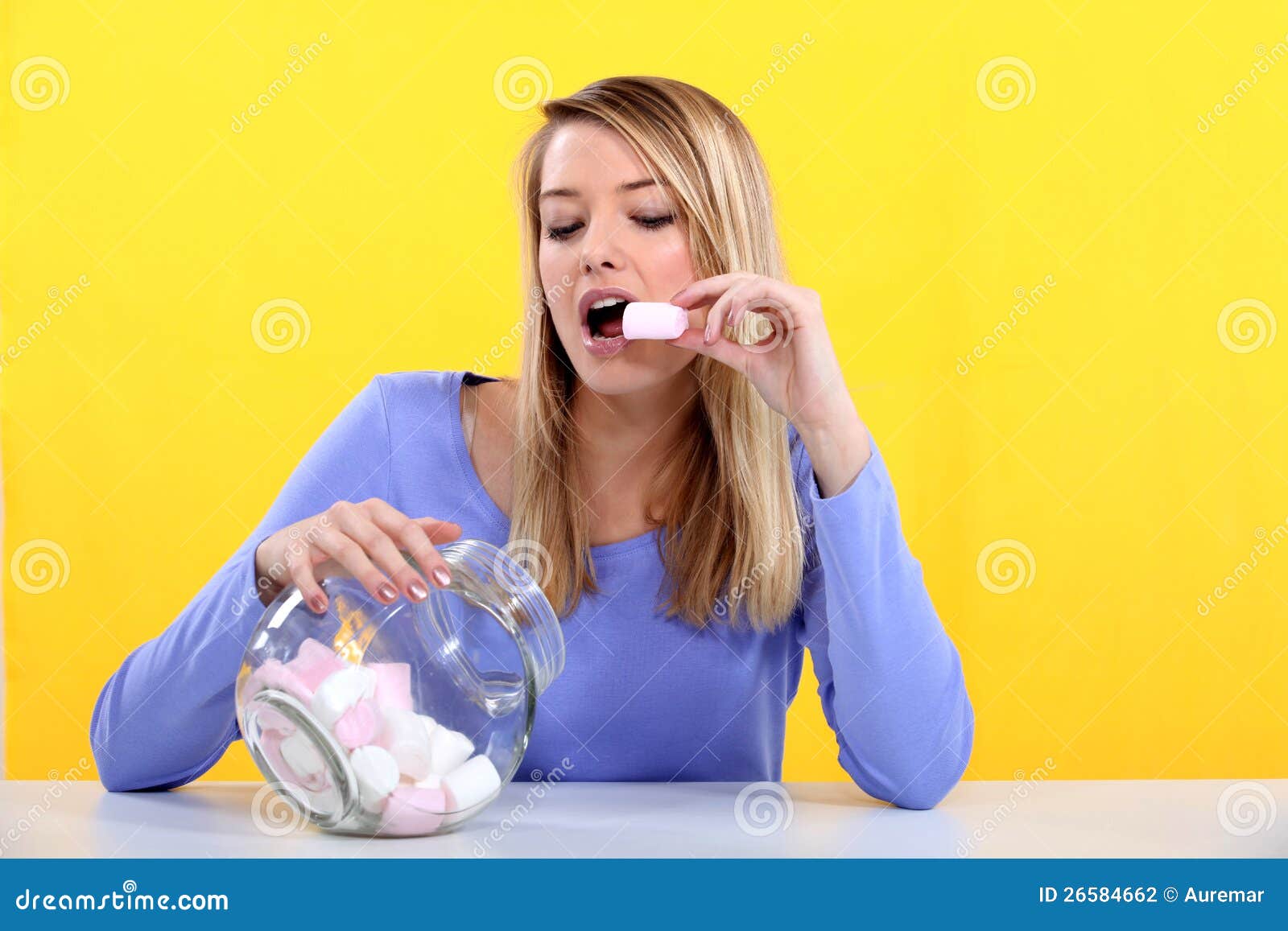Woman eating marshmallow stock photo. Image of cake, nutrition - 26584662
