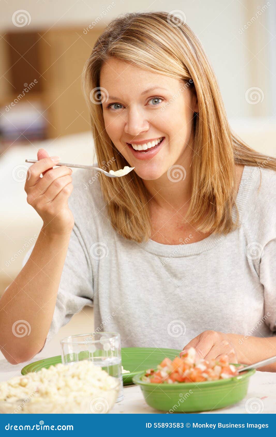 Woman eating meal stock image. Image of happy, meal, food - 55893583