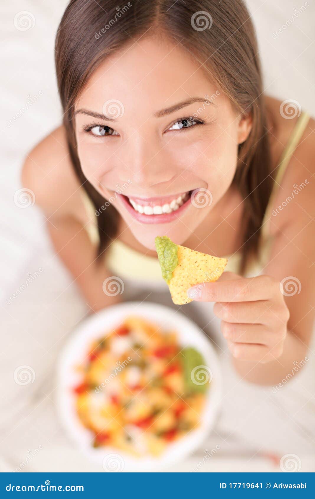 Woman eating nachos stock image. Image of copyspace, homemade - 17719641