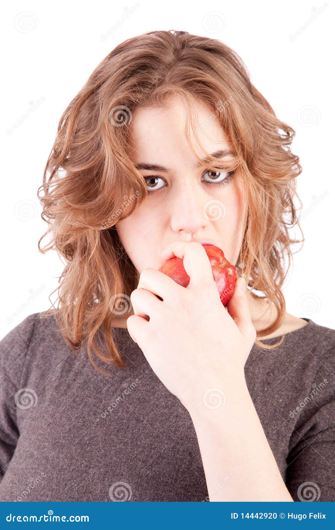 Woman eating red apple stock photo. Image of lifestyle - 14442920
