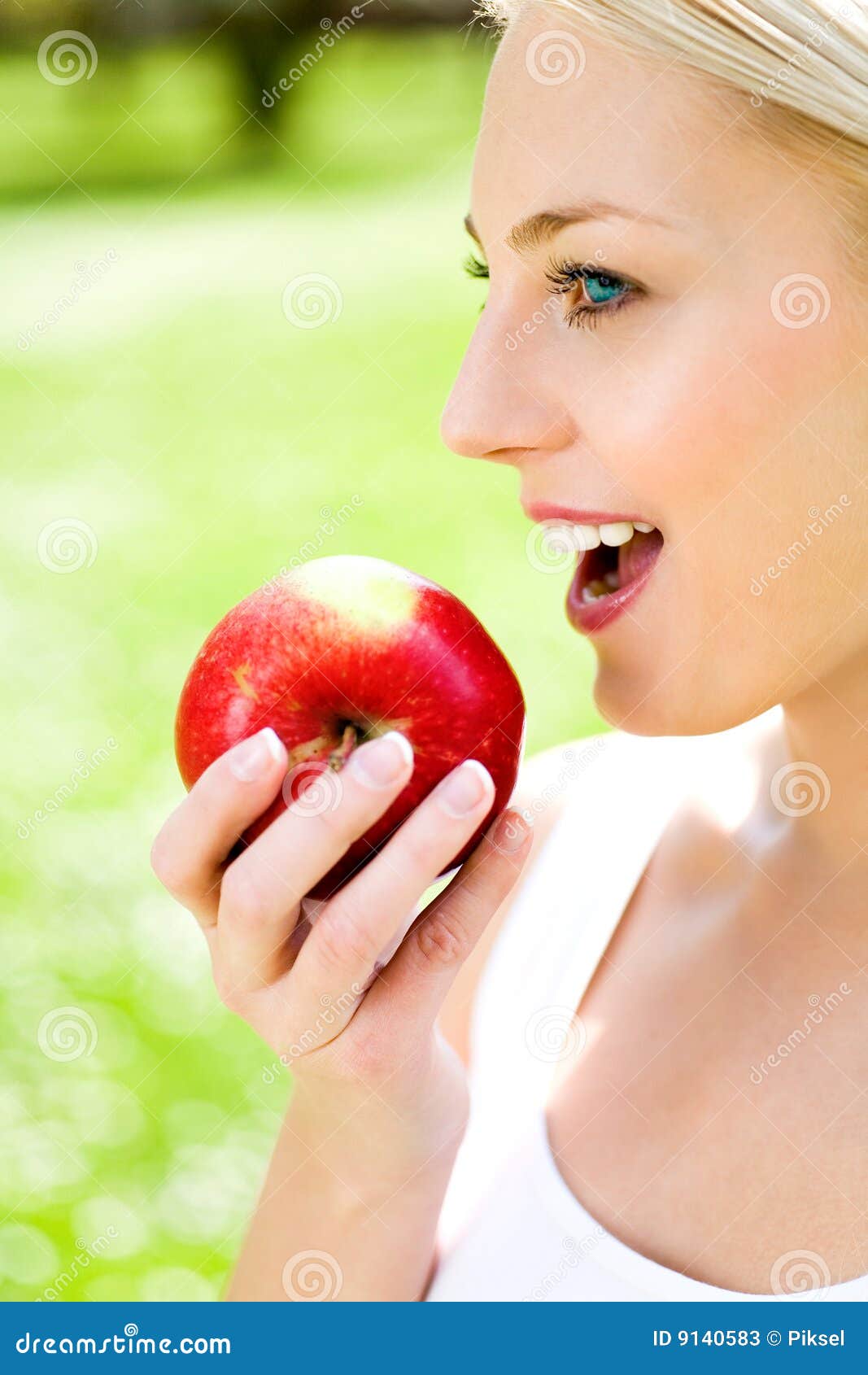 Woman eating red apple stock image. Image of tooth, apple - 9140583