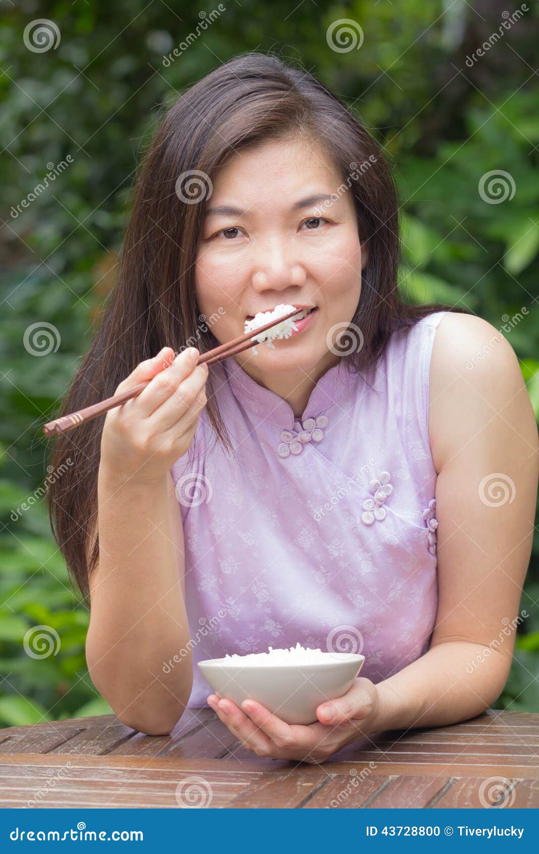 Woman eating rice stock photo. Image of meal, asian, looking - 43728800