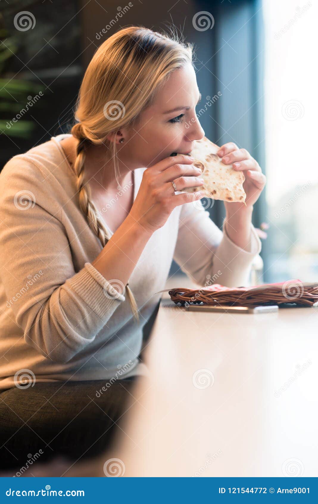Woman Eating a Sandwich in Train Stock Photo - Image of germany ...