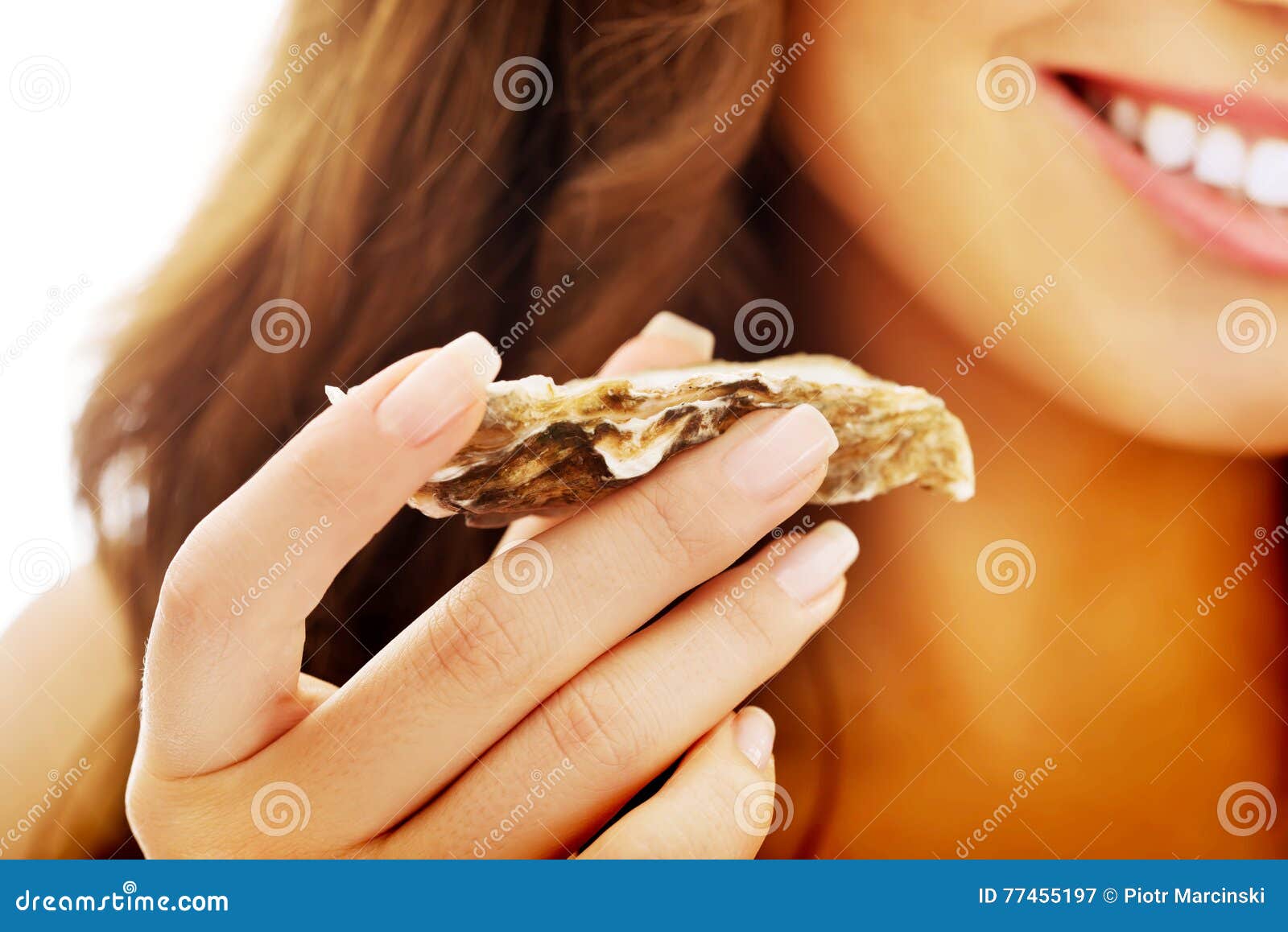 Woman eating shellfish. stock image. Image of lemon, human - 77455197