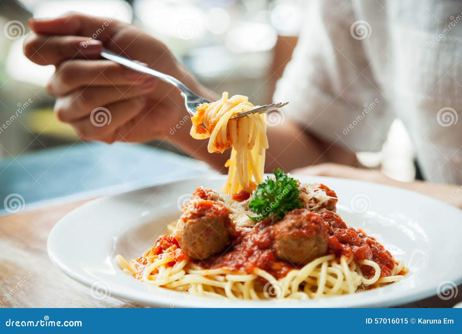 Woman eating spaghetti stock image. Image of mediterranean - 57016015