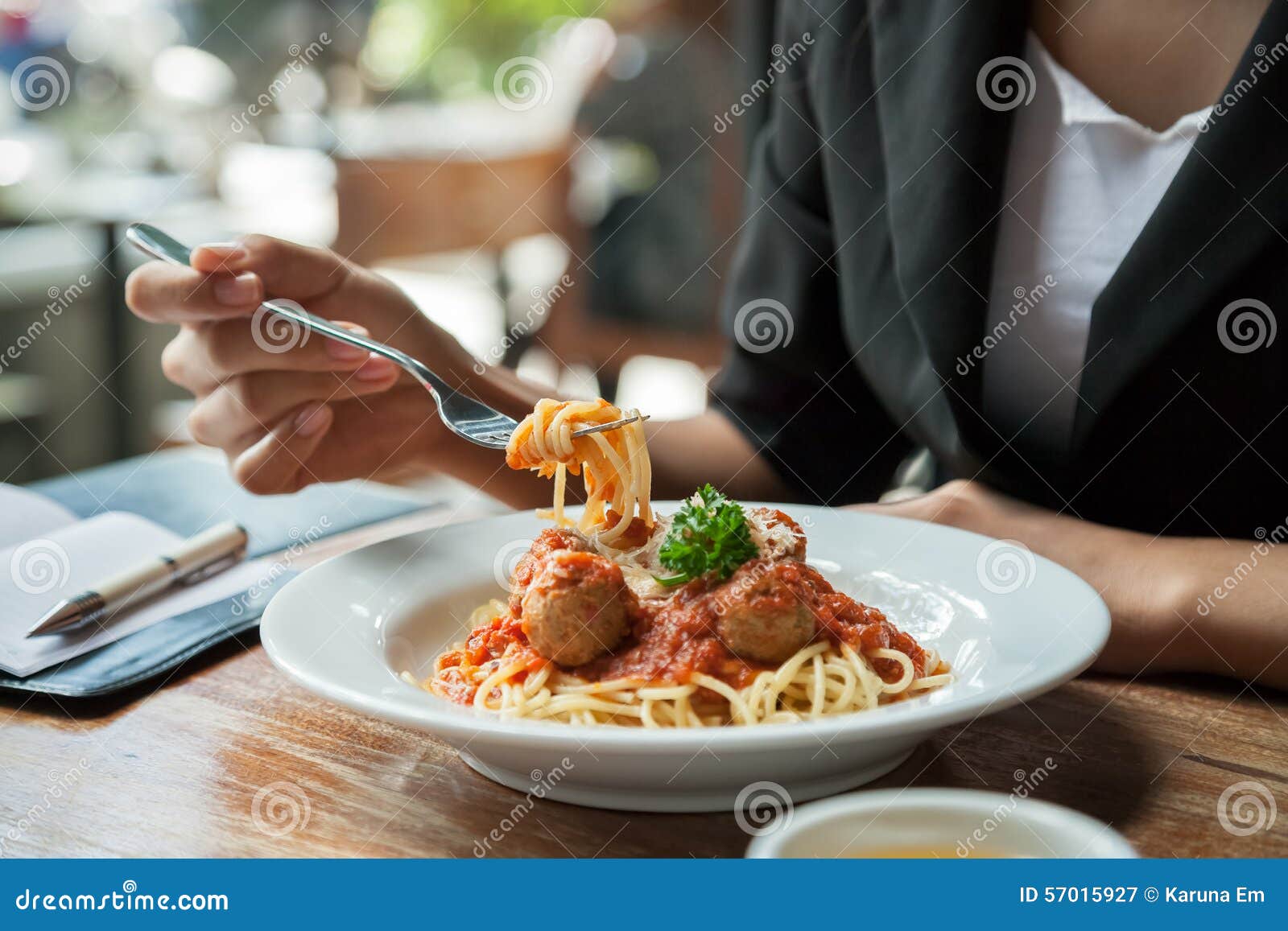 Woman eating spaghetti stock image. Image of parmesan - 57015927