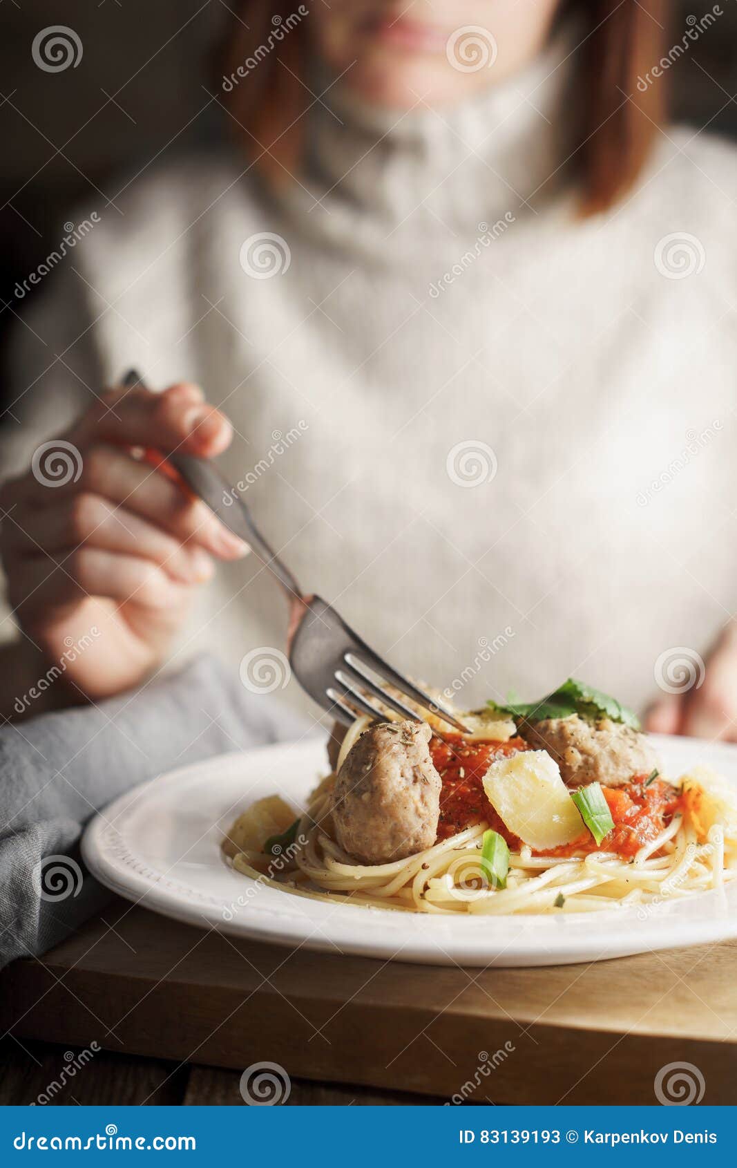 Woman Eating Spaghetti with Meatballs Stock Image - Image of basil ...