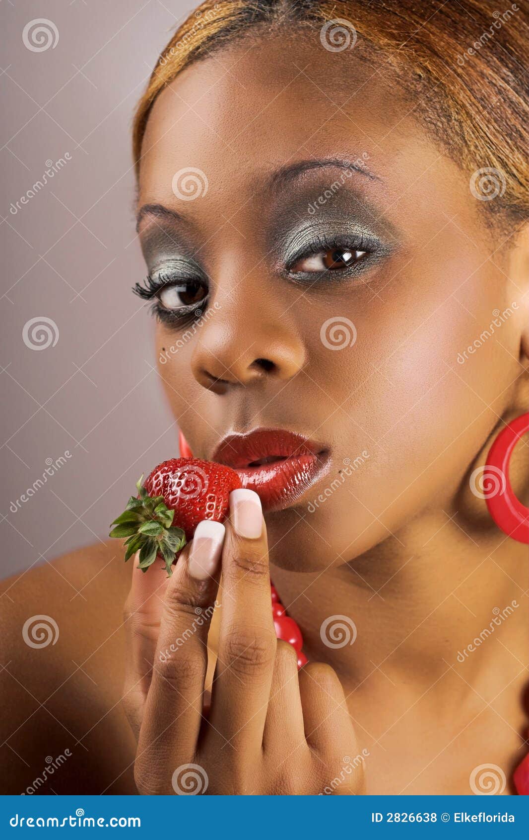 Woman eating strawberry stock photo. Image of freshness - 2826638