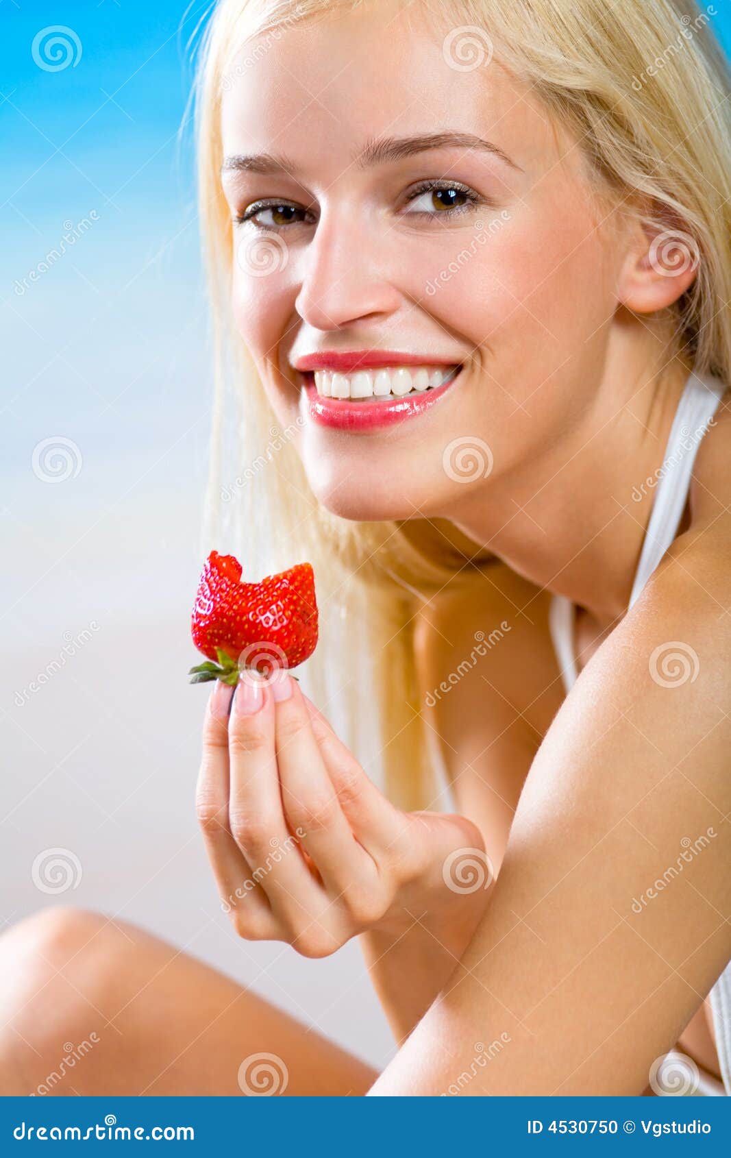 Woman eating strawberry stock photo. Image of summer, healthy - 4530750