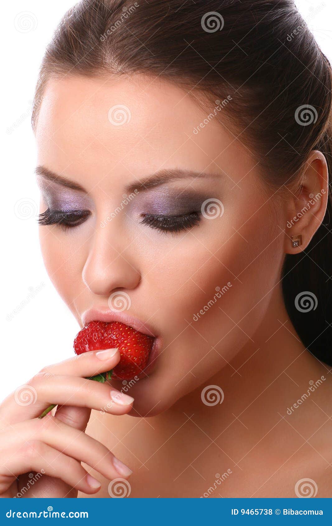 Woman eating strawberry stock photo. Image of cute, close - 9465738