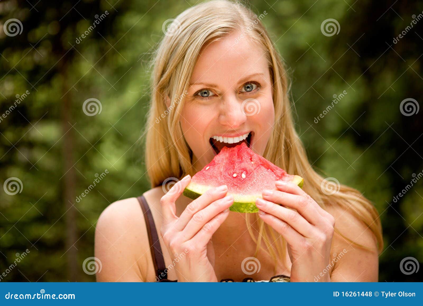 Woman Eating Watermelon stock photo. Image of people - 16261448