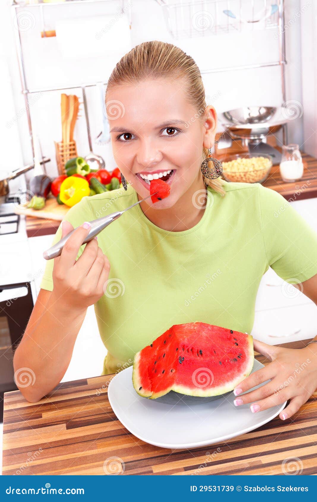 Woman eating watermelon stock image. Image of interior - 29531739