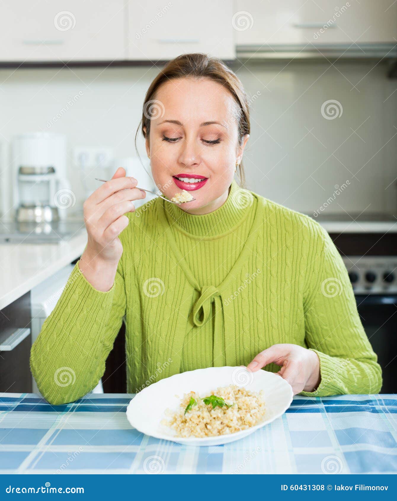Woman eats rice stock photo. Image of happy, people, breakfast - 60431308