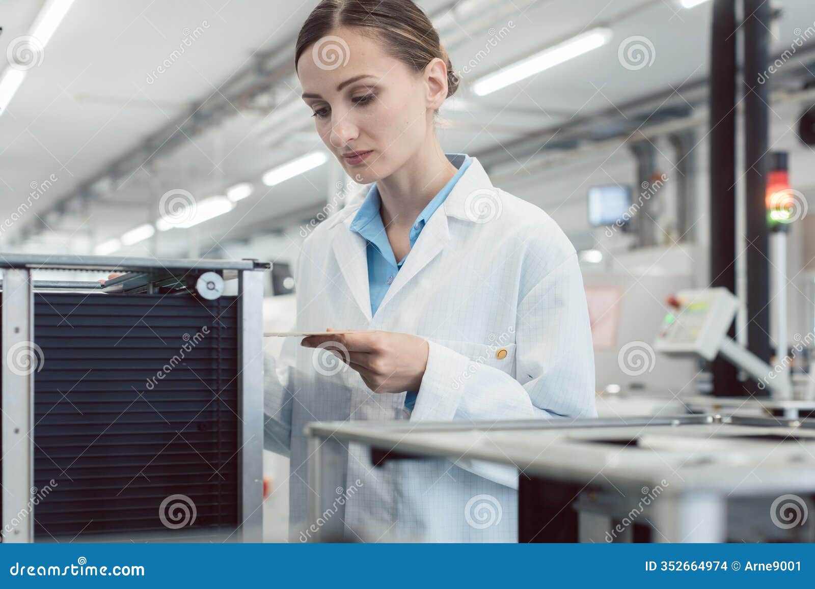 Electrical Engineer at Assembly Line Inspecting PCB Boards Stock Photo ...