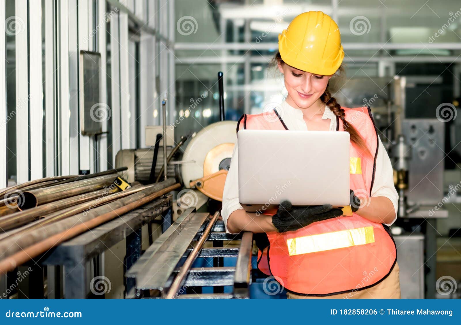 Woman Engineer Caucasian she is Using a Notebook Computer for ...