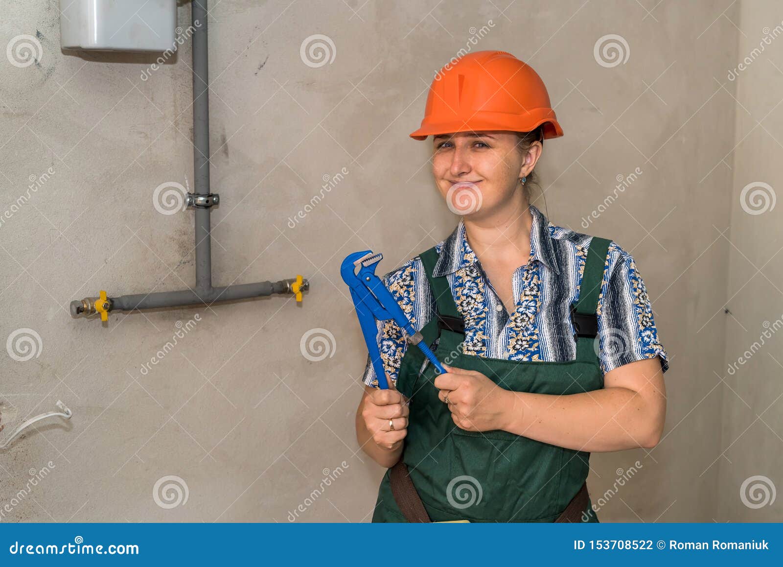 Woman Engineer with Tool Belt and Adjustable Key Stock Photo - Image of ...