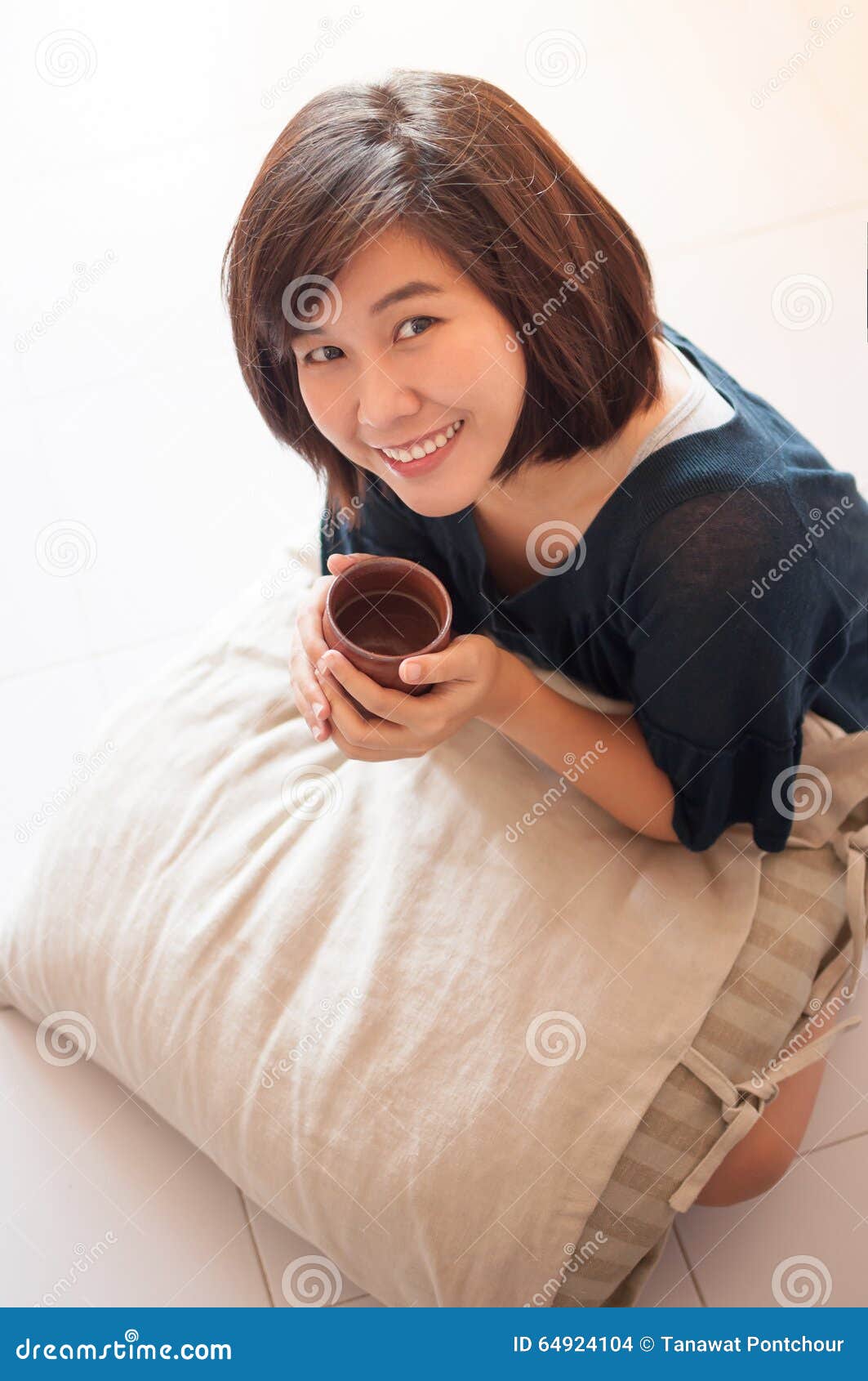 Woman enjoy drinking tea. stock photo. Image of asian - 64924104