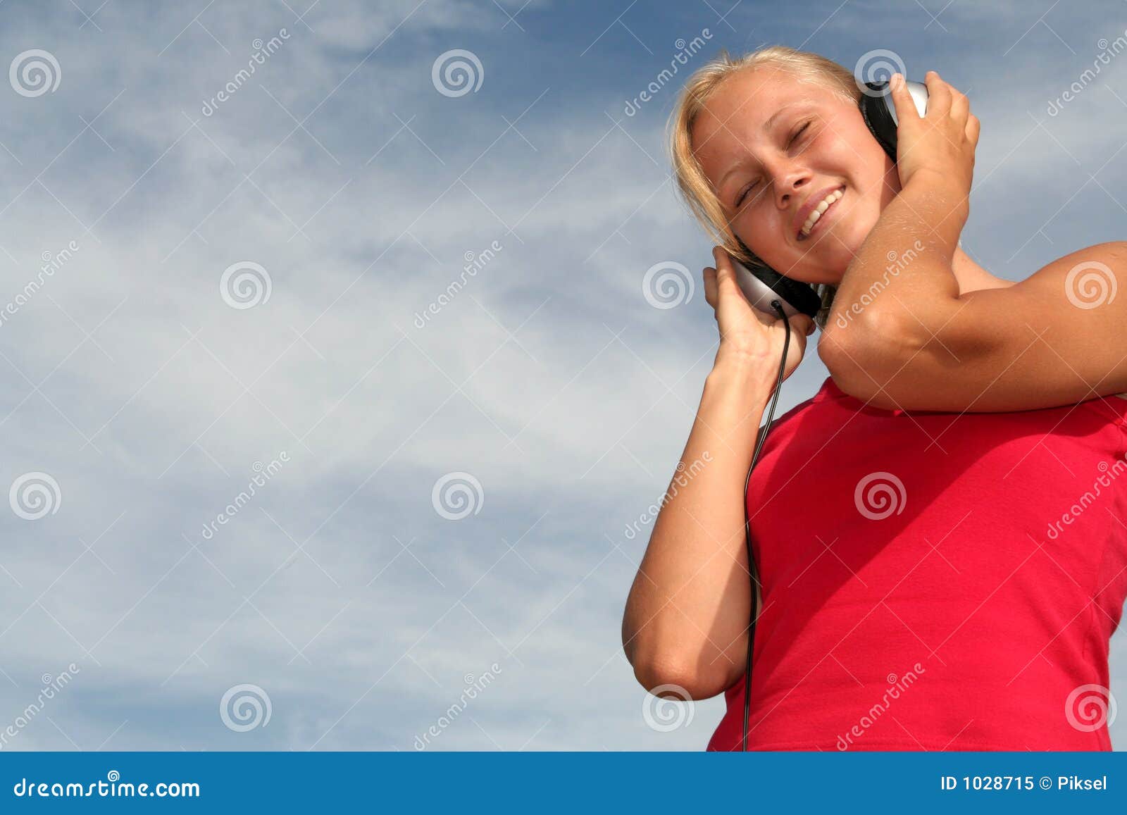 Woman Enjoying Music stock image. Image of music, blonde - 1028715