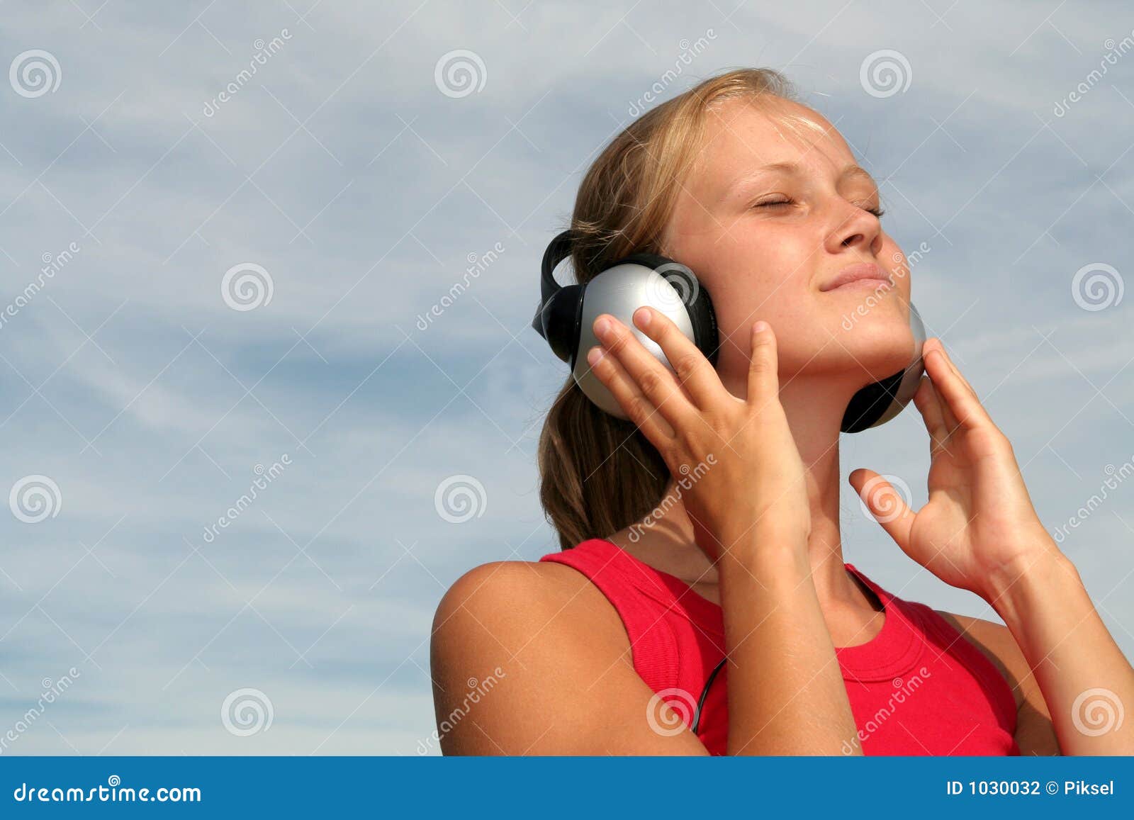 Woman Enjoying Music stock photo. Image of listen, audio - 1030032