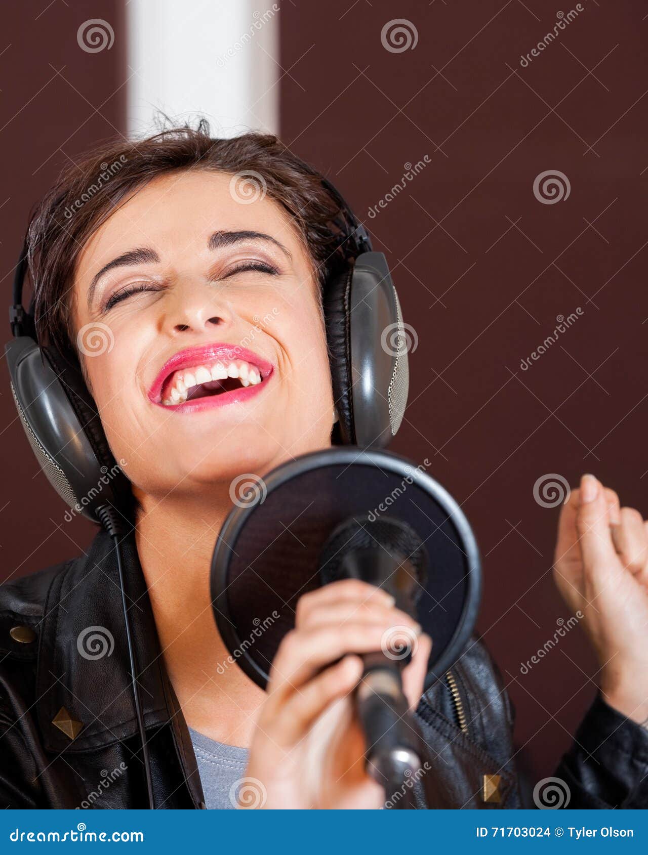 Woman Enjoying while Singing in Studio Stock Photo - Image of eyes ...