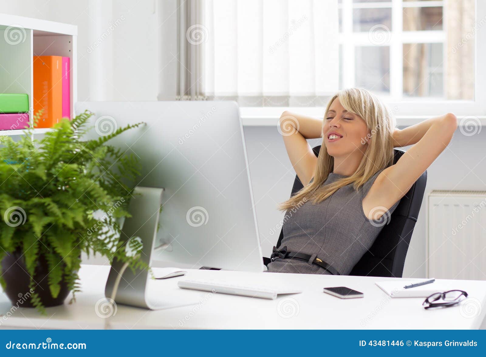 Woman Enjoying Successful Day at Work Stock Photo - Image of ...