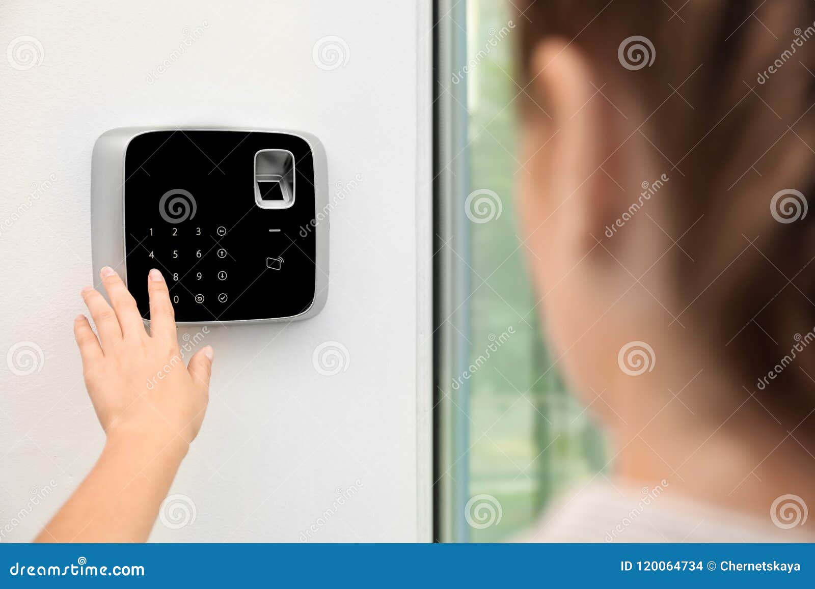 Woman Entering Code on Alarm System Keypad Indoors Stock Photo - Image ...