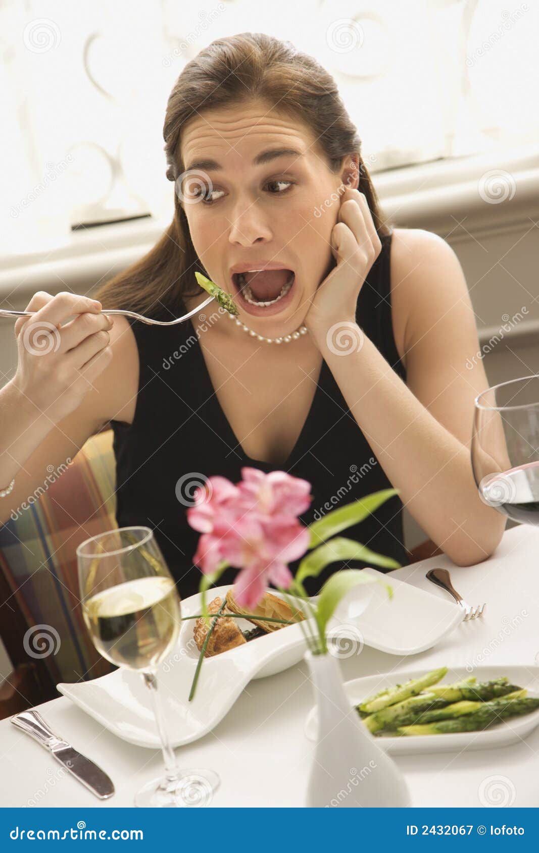 Woman exaggerating eating. stock image. Image of open - 2432067