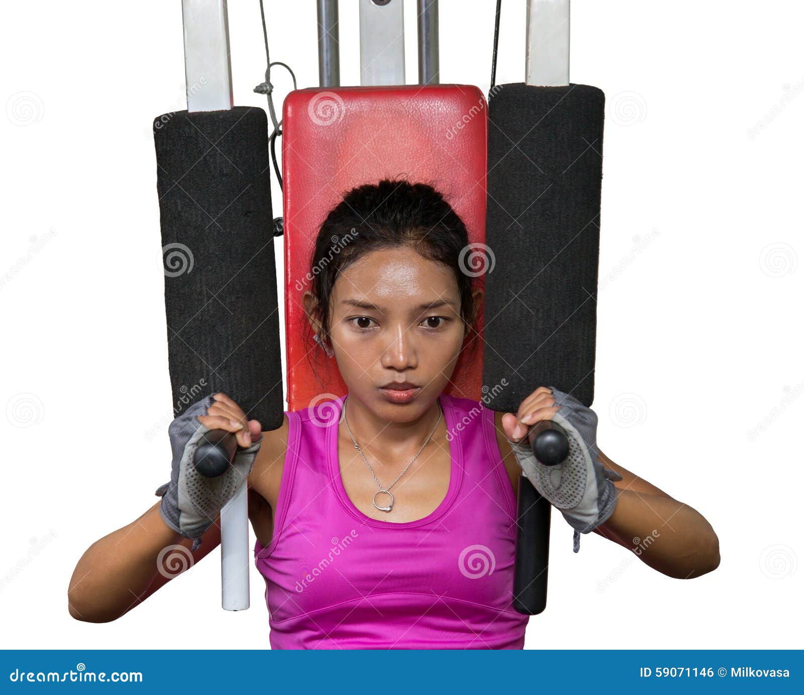 Woman exercises on machine stock photo. Image of beauty - 59071146