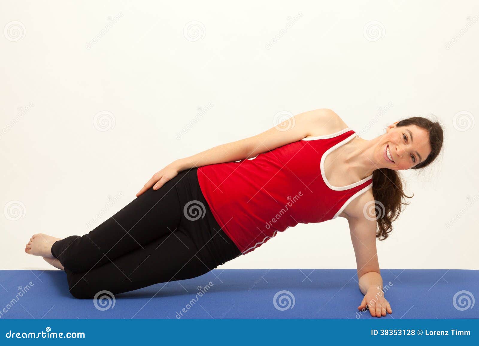 The Woman is Exercising on a Mat Stock Photo - Image of active, health ...