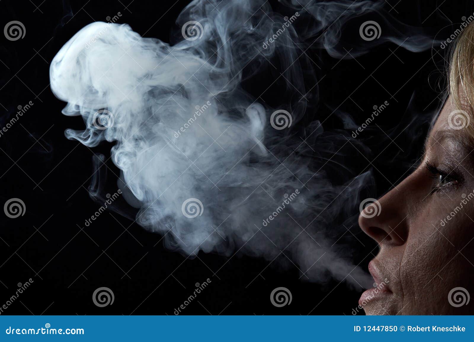 Woman exhaling smoke stock photo. Image of face, people - 12447850