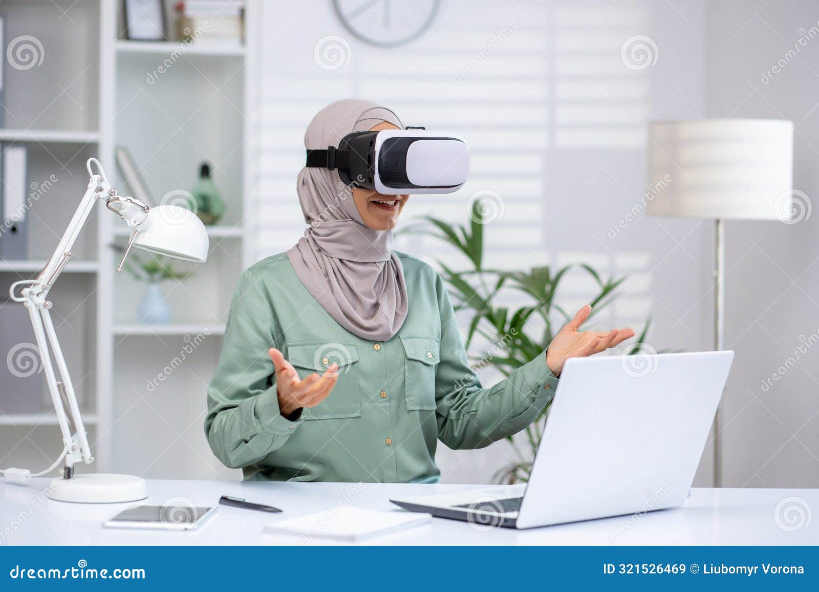 Woman Experiencing Virtual Reality with VR Headset at Home Office Desk ...