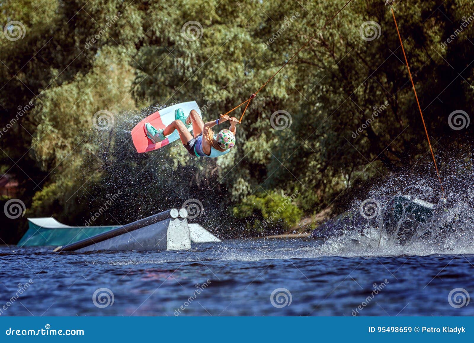 Woman is an Extreme in a Jump Over the Water. Stock Image - Image of ...