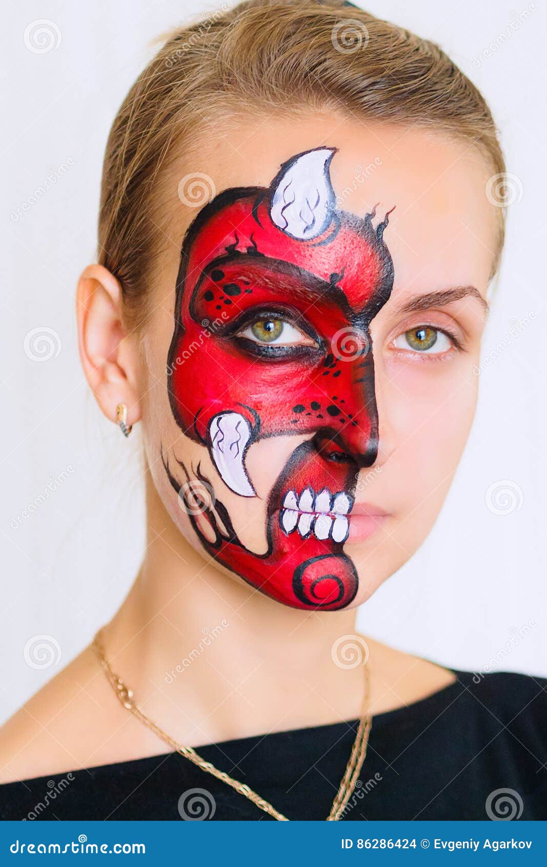 Woman Face with Painted Devil Mask on it on White Background Stock ...