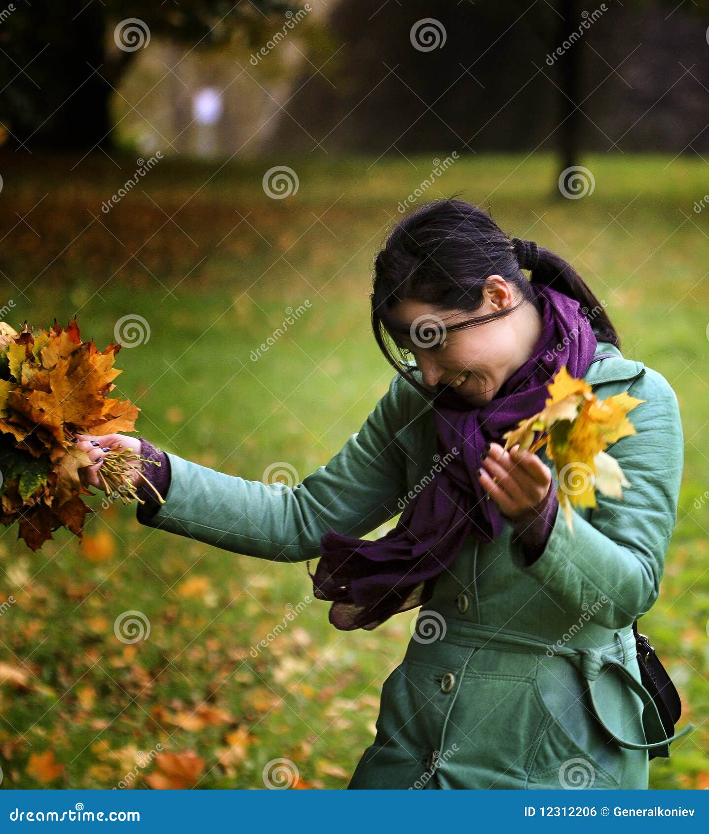 Woman with fallen leaves stock photo. Image of foliage - 12312206