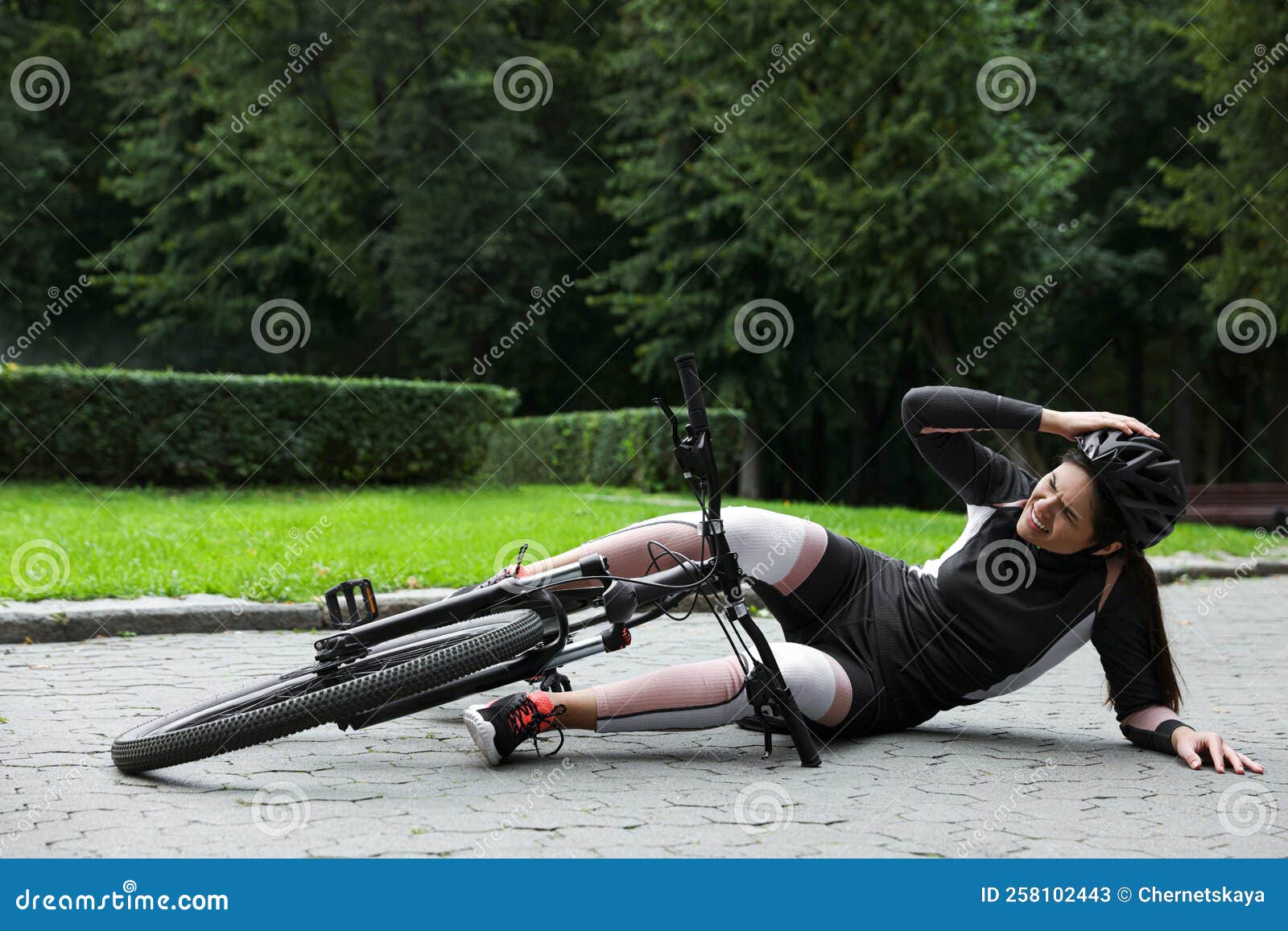 Young Woman Fallen Off Her Bicycle in Park Stock Image - Image of ...