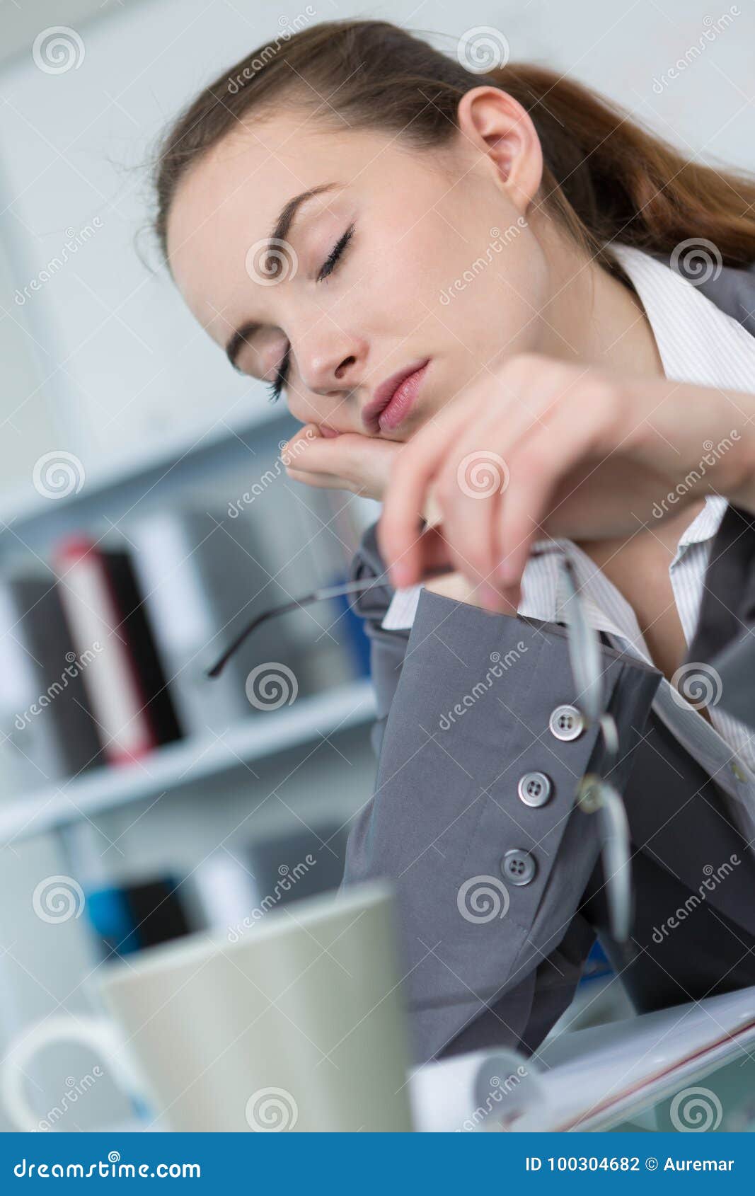 Woman Falling Asleep at Desk Stock Photo - Image of asleep, teacup ...