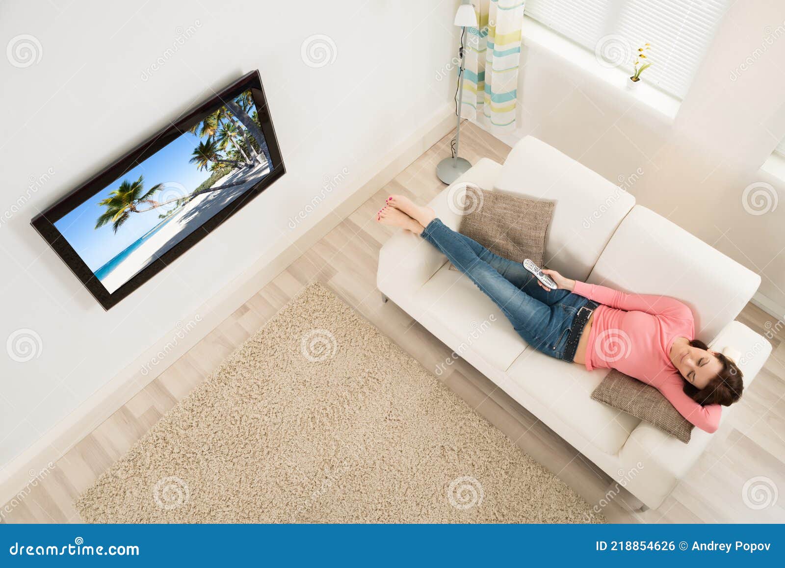 Woman Falling Asleep while Watching Television Stock Photo - Image of ...