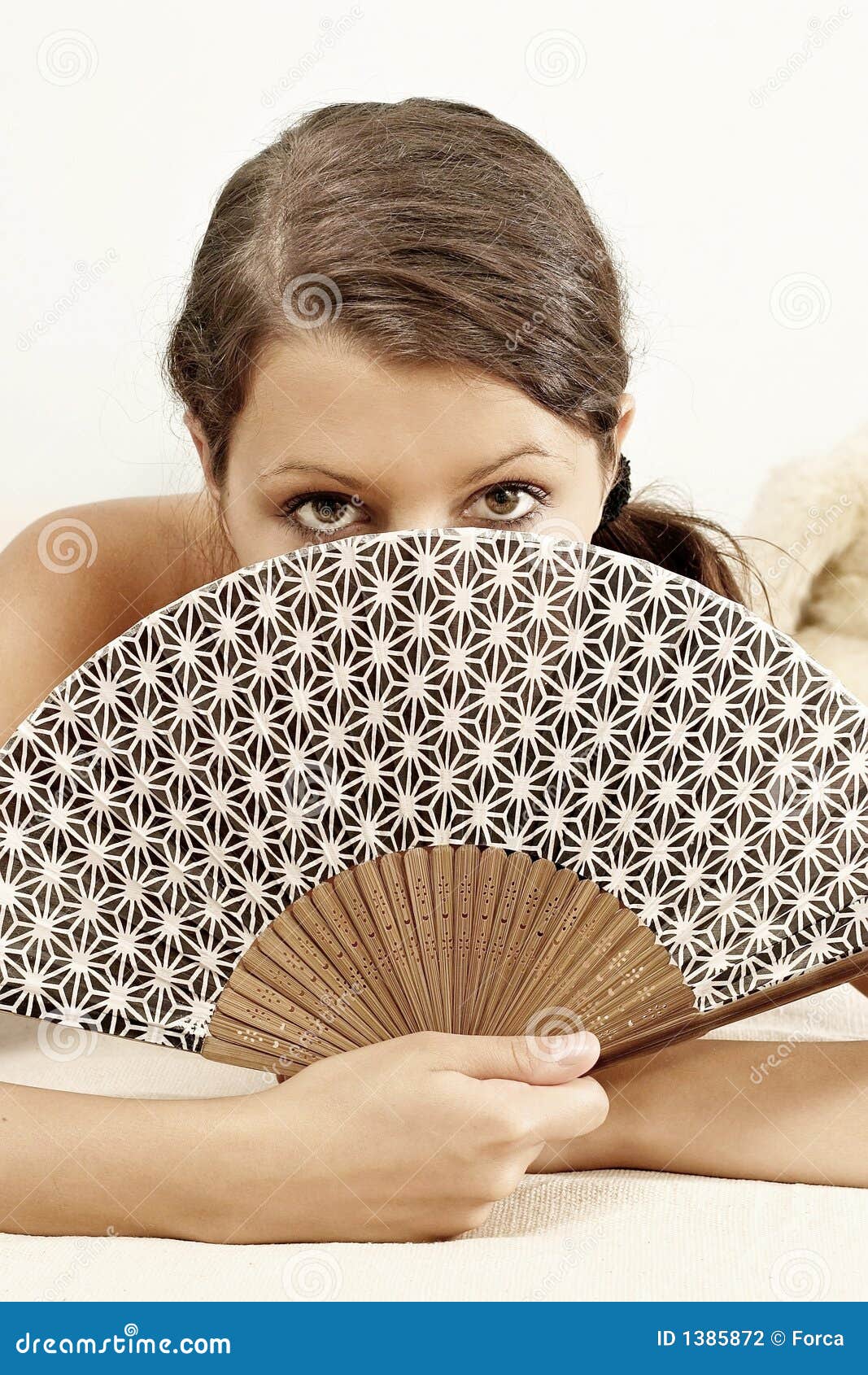 Woman with a fan stock photo. Image of eyes, look, girl - 1385872