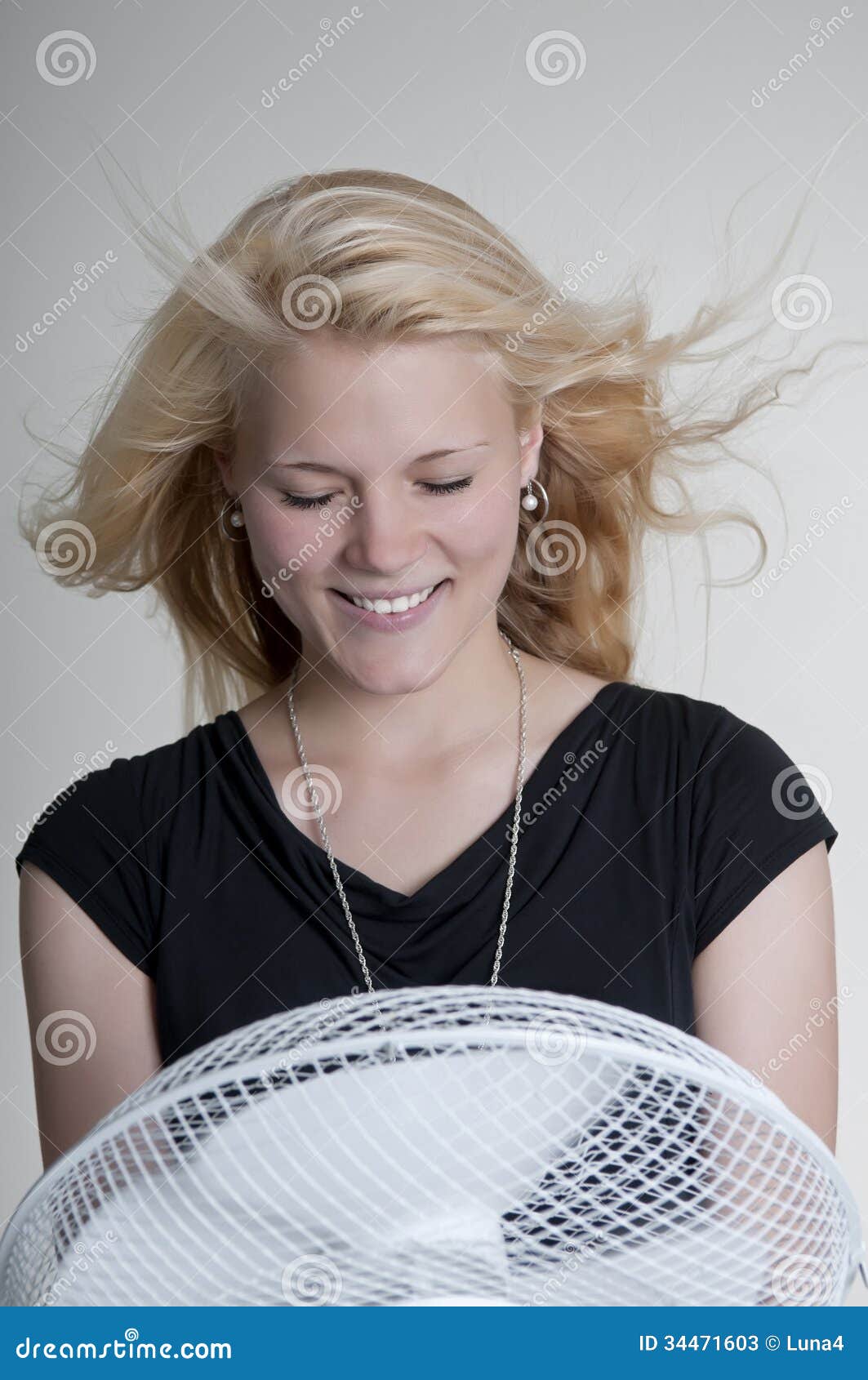 Woman with fan stock image. Image of circulation, blond - 34471603