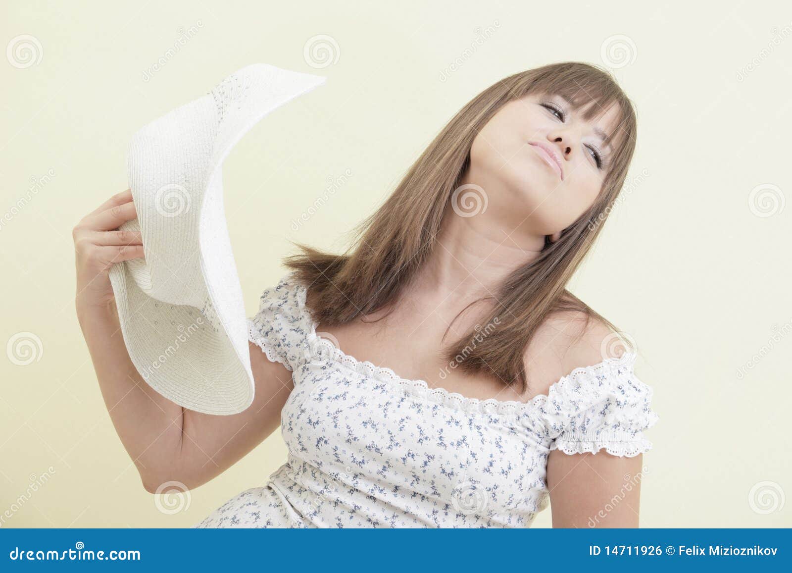 Woman Fanning Herself with a Hat Stock Photo - Image of studio, woman ...